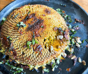 People are grilling whole sunflower heads like corn on the cob and it's ...