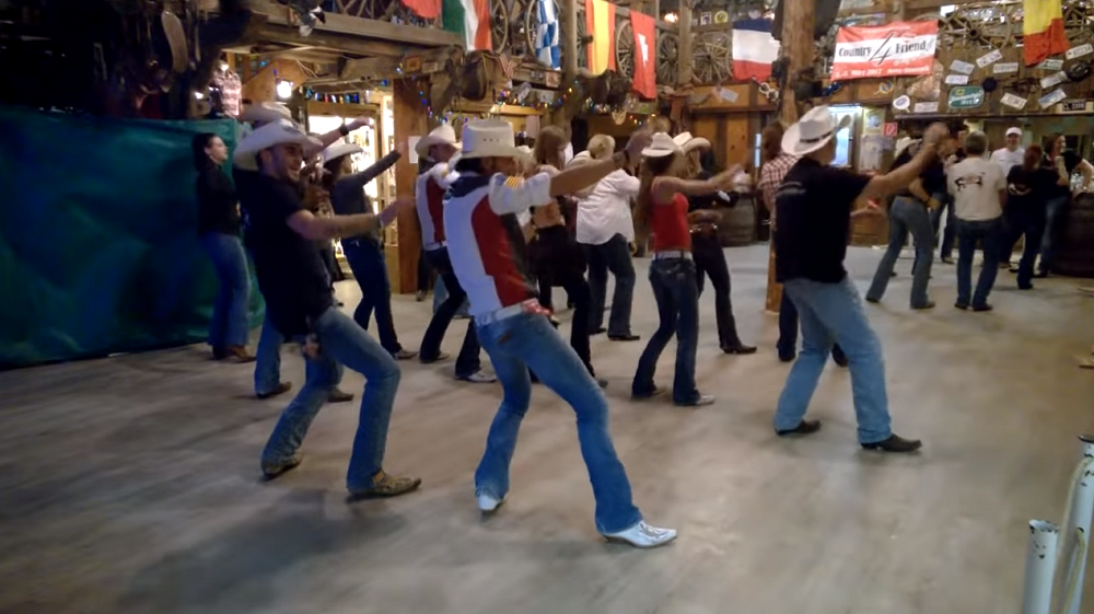 Country dancers caught breaking out slick moves to hip-hop ‘Wobble’