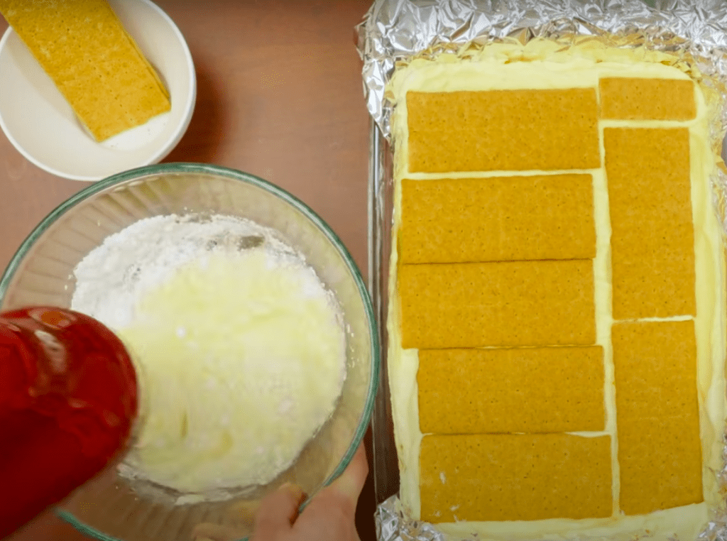 Lemon Pudding Layered Over Graham Crackers Makes Enticing Dessert