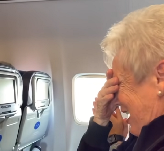 Pilot makes elderly woman cry when he calls her out and leaves cockpit ...