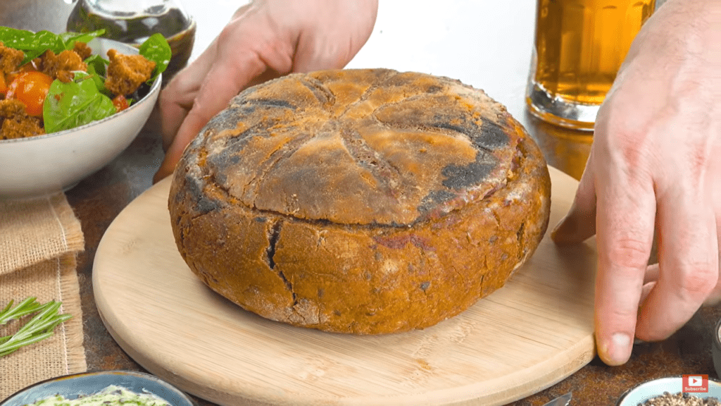 Carve out the inside of a loaf of bread then fill it with these 6 ...