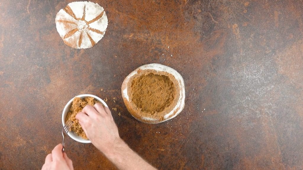 Carve out the inside of a loaf of bread then fill it with these 6 ...