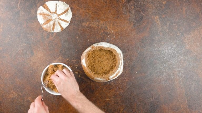 Carve out the inside of a loaf of bread then fill it with these 6 ...