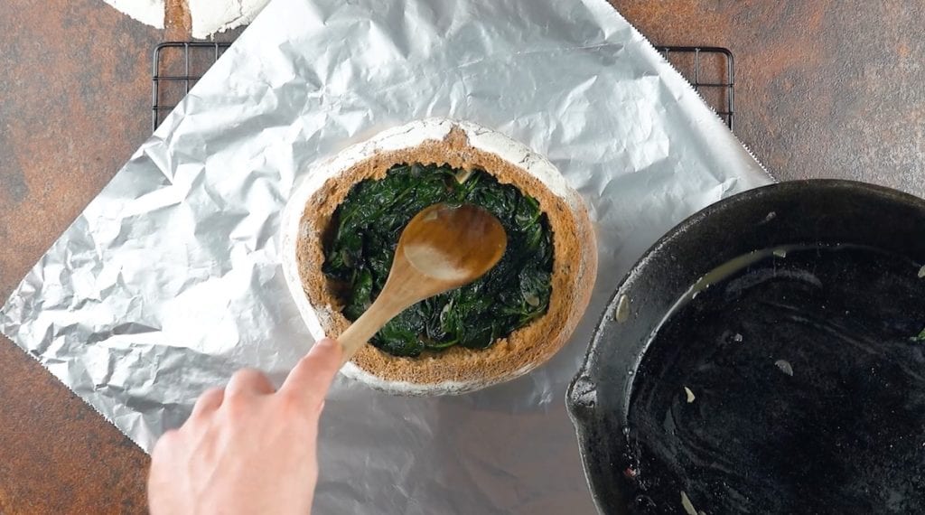 Carve out the inside of a loaf of bread then fill it with these 6 ...