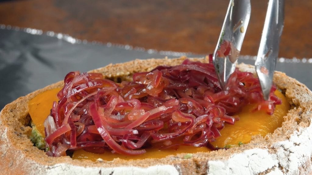 Carve out the inside of a loaf of bread then fill it with these 6 ...