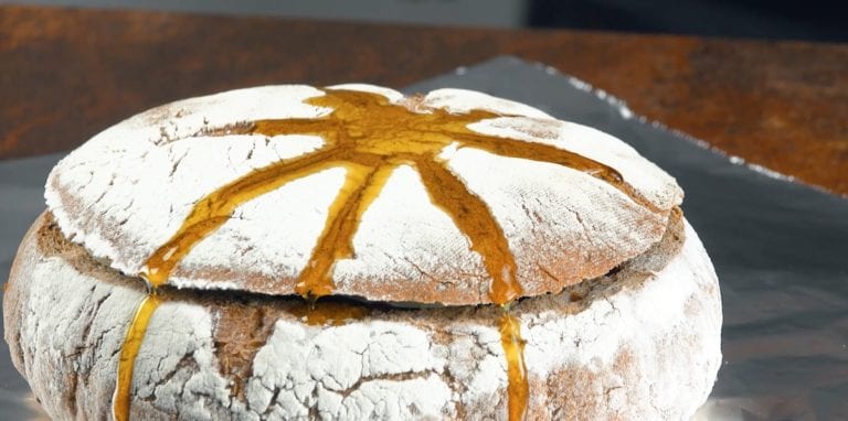 Carve out the inside of a loaf of bread then fill it with these 6 ...