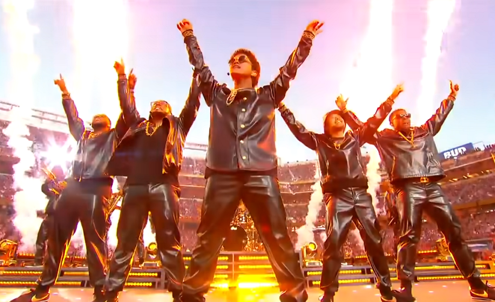 Dance team lifts bowed heads. Steal the show in seconds of first note