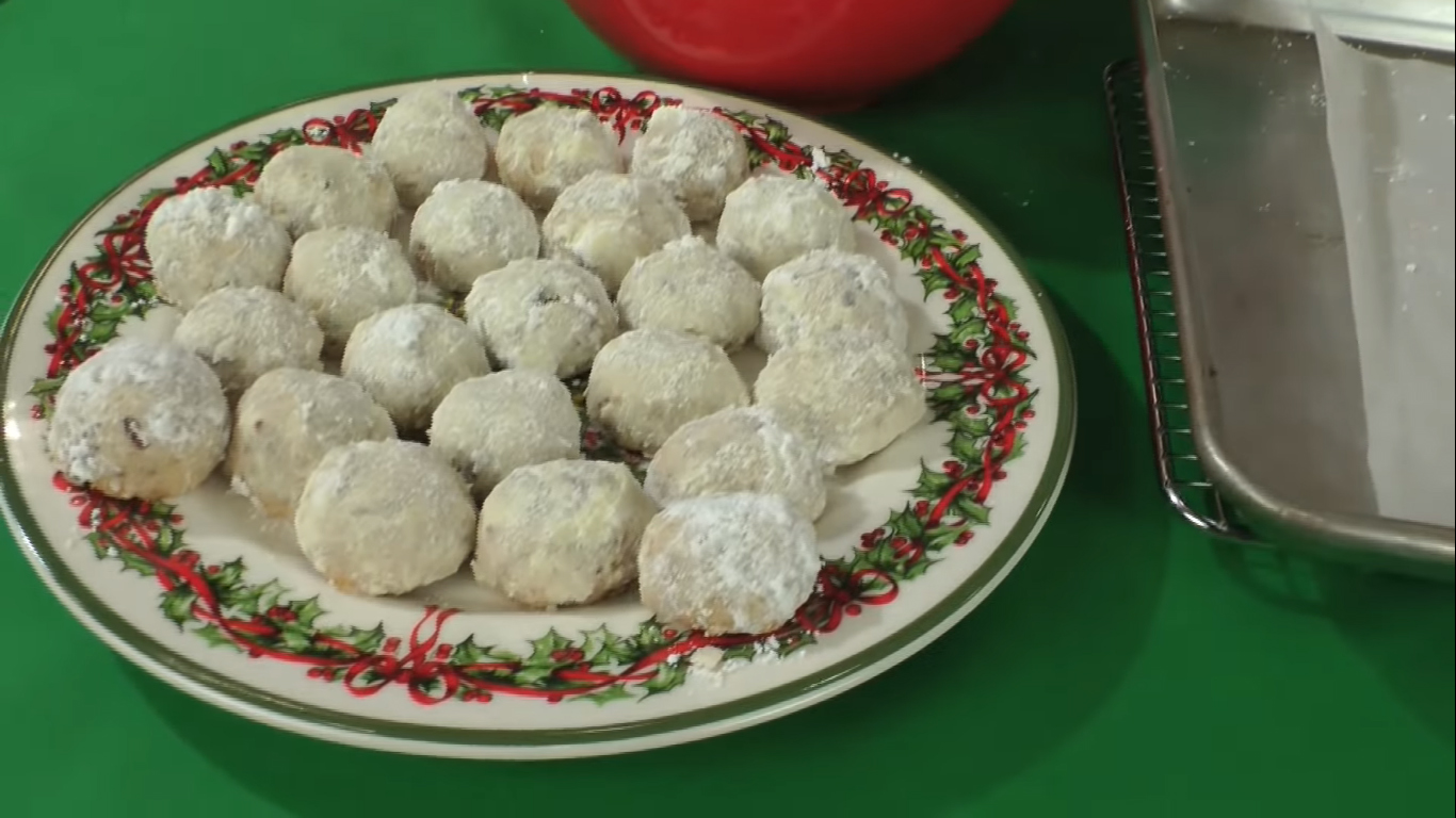 Woman mixes 6 ingredients in a bowl for an easy Christmas snowball ...