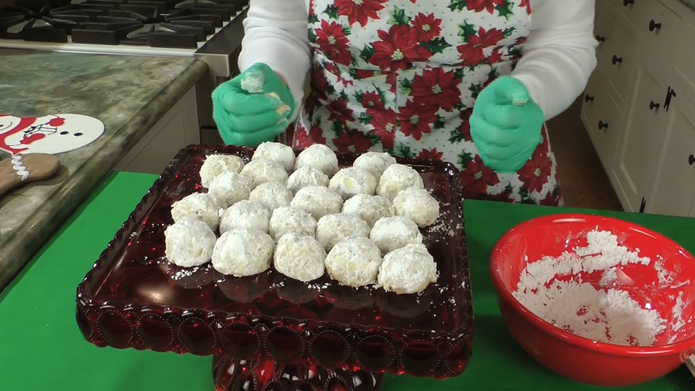 Mix 6 ingredients in a bowl for this easy Christmas snowball cookie recipe