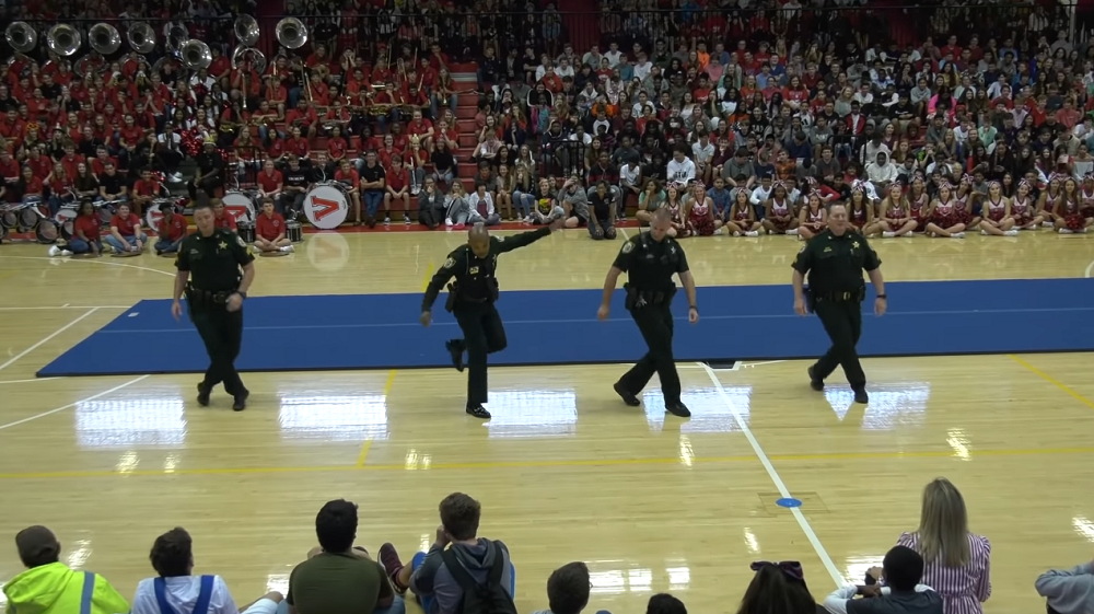 Students go silent when pep rally gets interrupted by cops