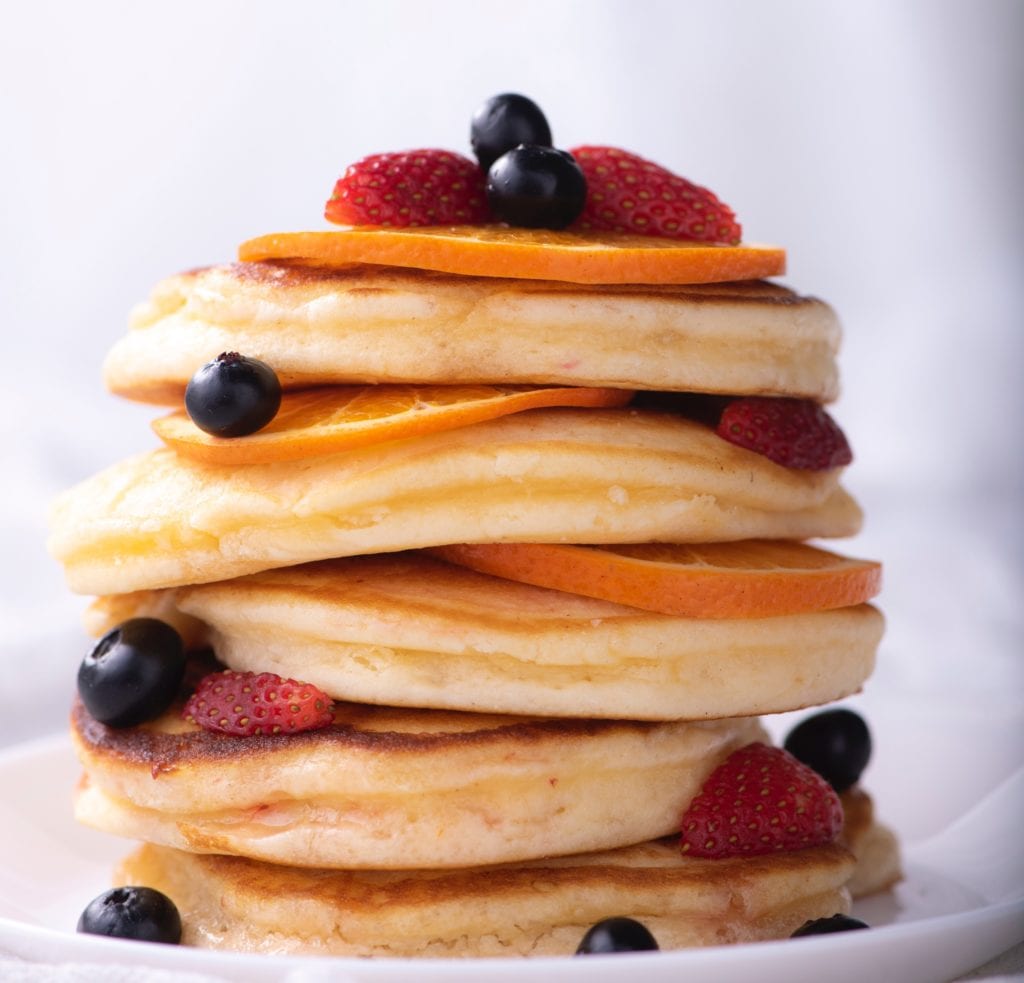 Pour egg into a tomato with a slice of cheese for a savory and ...