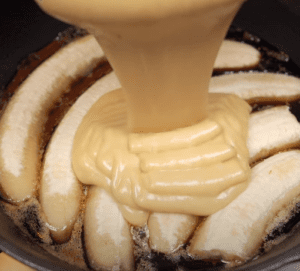 Woman Shows How To Make Heavenly Upside Down Banana Cake