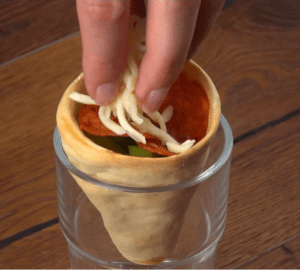 Take pizza to a whole new level with these delicious “stuffed pizza cones”