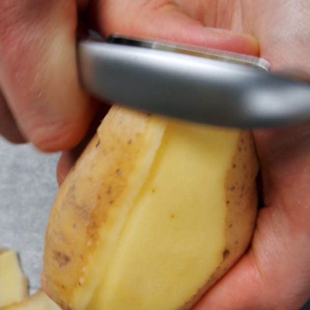 Chef hollows out potatoes then stuffs them for the crispiest and ...