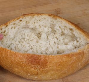 Pour 7 eggs into a hollowed-out bread loaf for delicious breakfast idea