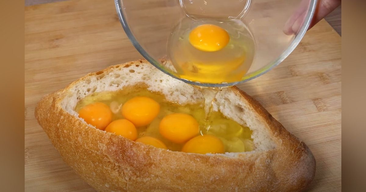 Pour 7 eggs into a hollowed-out bread loaf for delicious breakfast idea