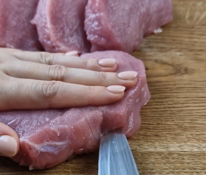 Cut deep into pork and stuff with savory ingredients for delicious dinner