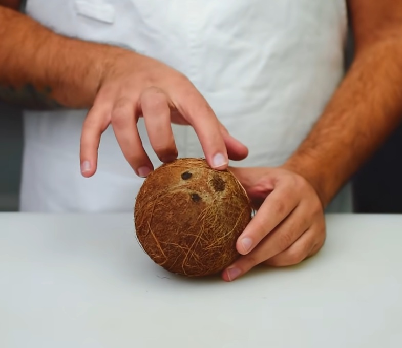 Chef shows simple way he opens coconuts without using a hammer or ...