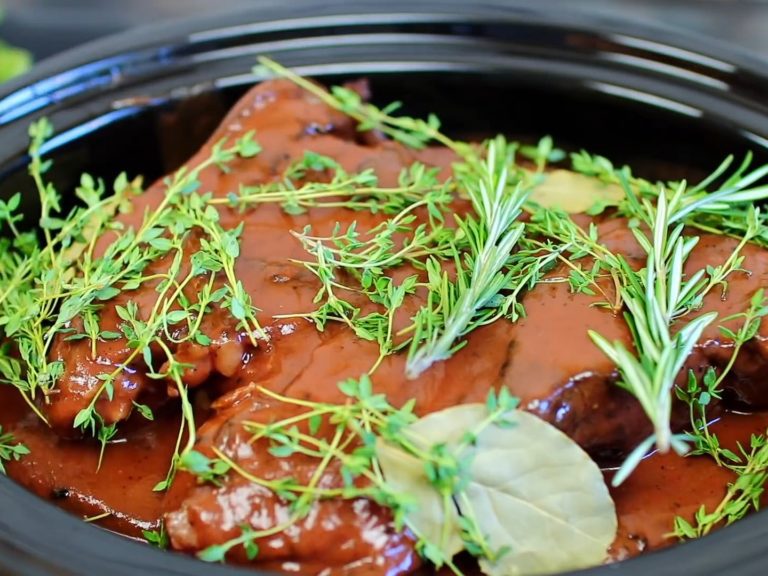 Add slab of beef to crock pot and cover with veggies for mouthwatering ...