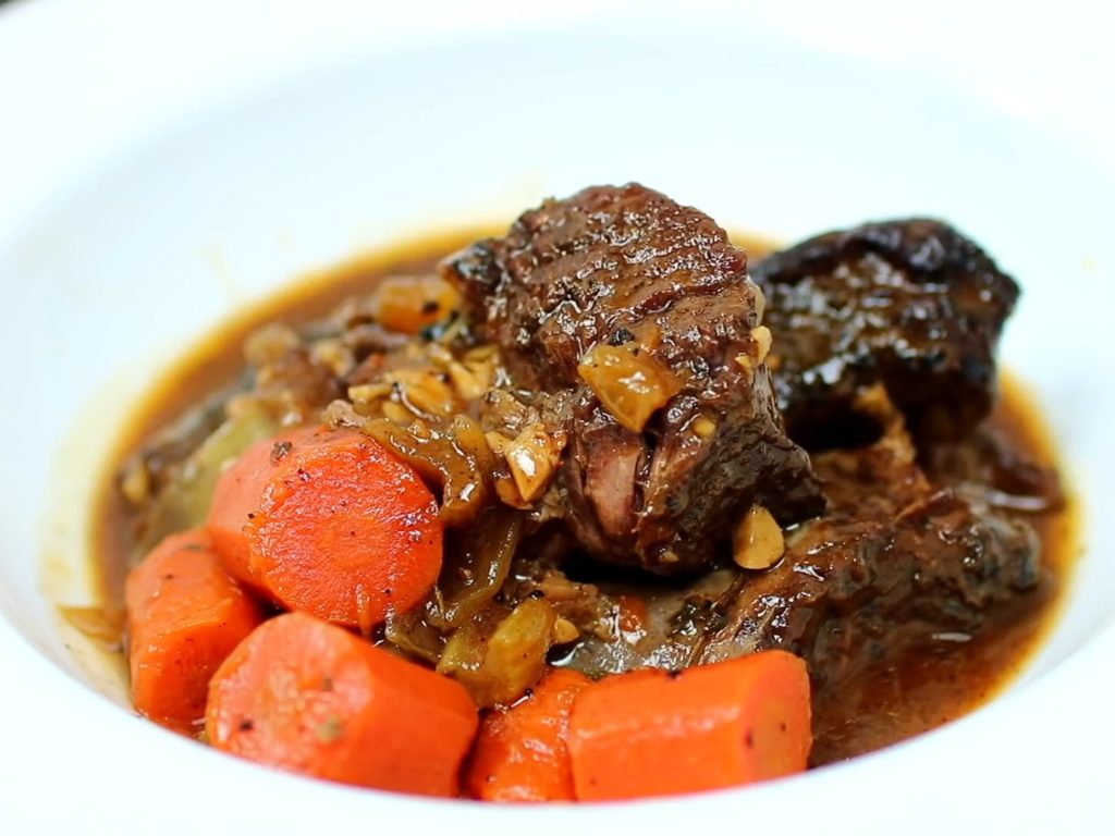 Add slab of beef to crock pot and cover with veggies for mouthwatering ...