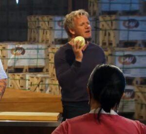 Professional chef demonstrates how to chop an onion the correct way and ...