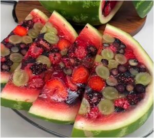 Grandma pours fruit into watermelon for gorgeous healthy summer snack ...