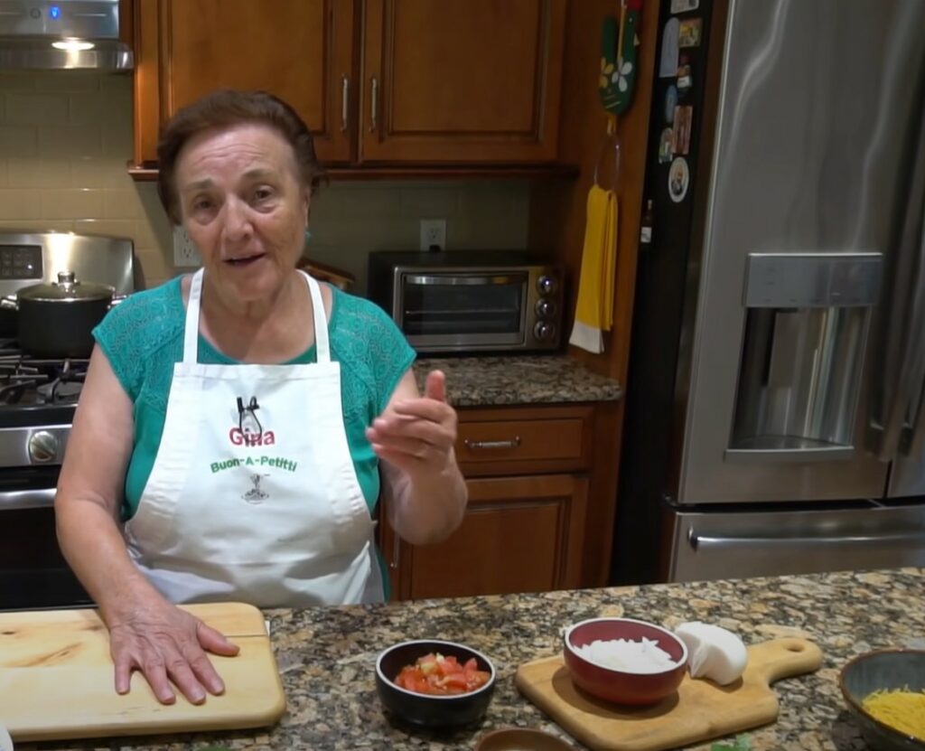 Italian grandma loads her stock pot with veggies for delicious easy-to ...