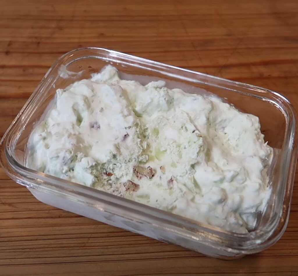 Grandpa mixes pineapples and pudding for “frozen green fluff” dessert ...