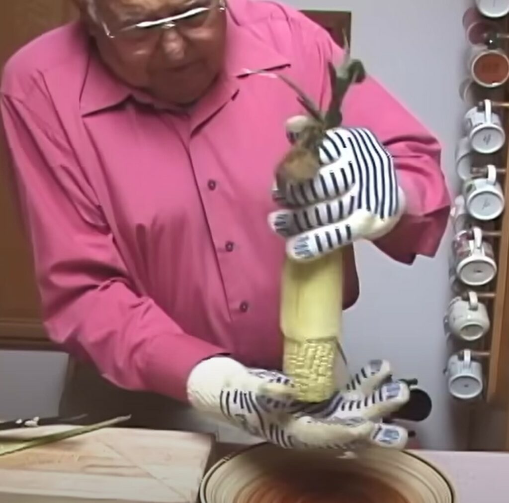 Grandpa shows how he shucks his corn for “clean ears every time”