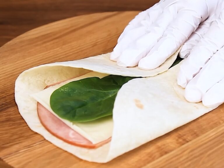 Fold tortillas into envelopes and layer them with fillings for ...